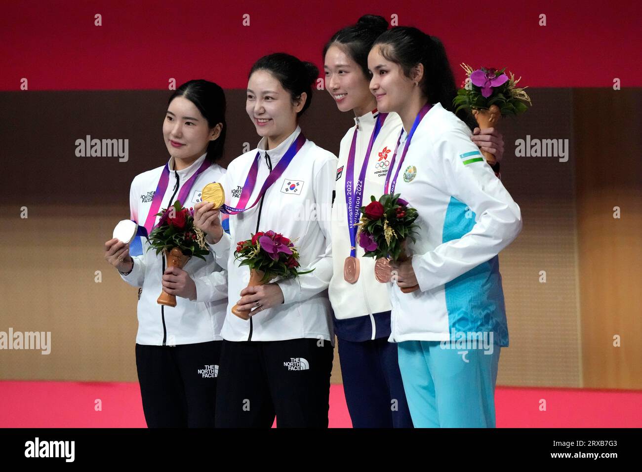 Gold medalist Injeong Choi of South Korea, second left, poses with ...