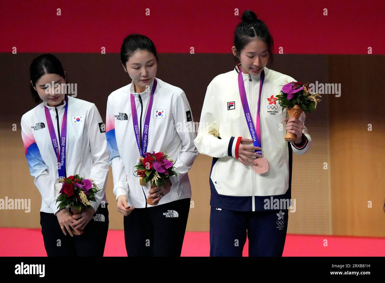 Gold medalist Injeong Choi of South Korea, center, leaves with silver ...
