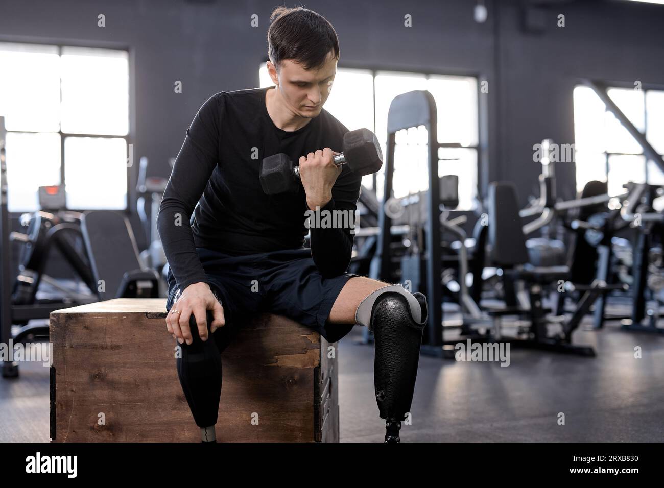 A young strong handsome motivated man with a disability with a ...