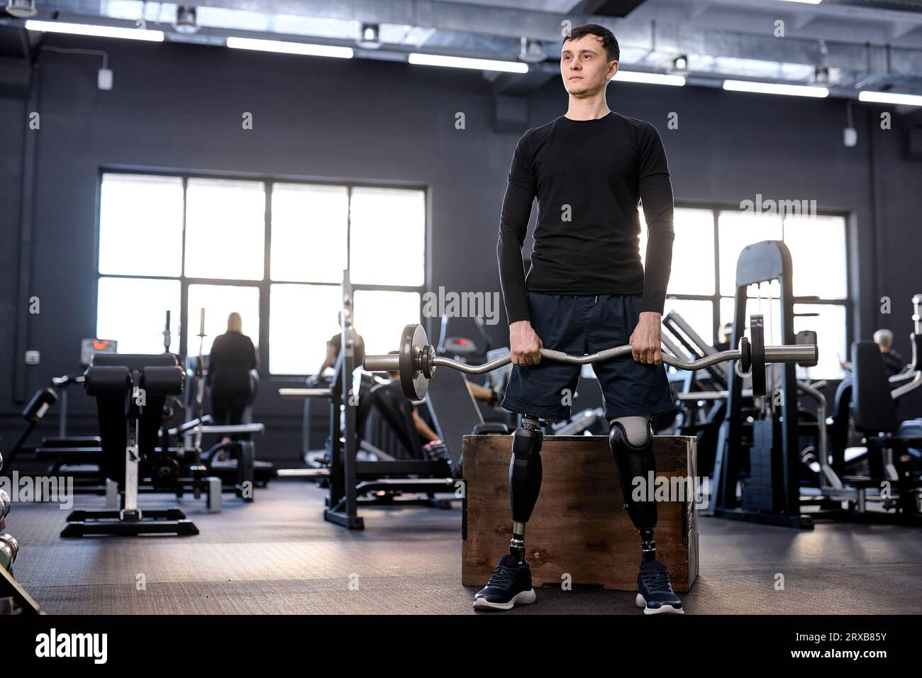 Man holding prosthetic leg standing hi-res stock photography and images ...