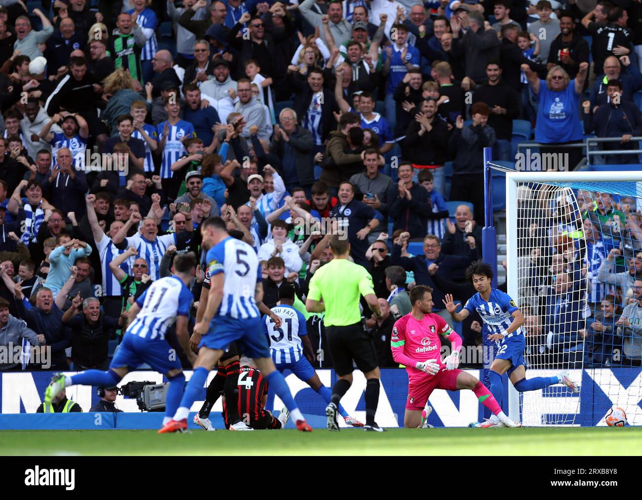 Brighton and Hove Albion's Kaoru Mitoma (right) celebrates scoring ...