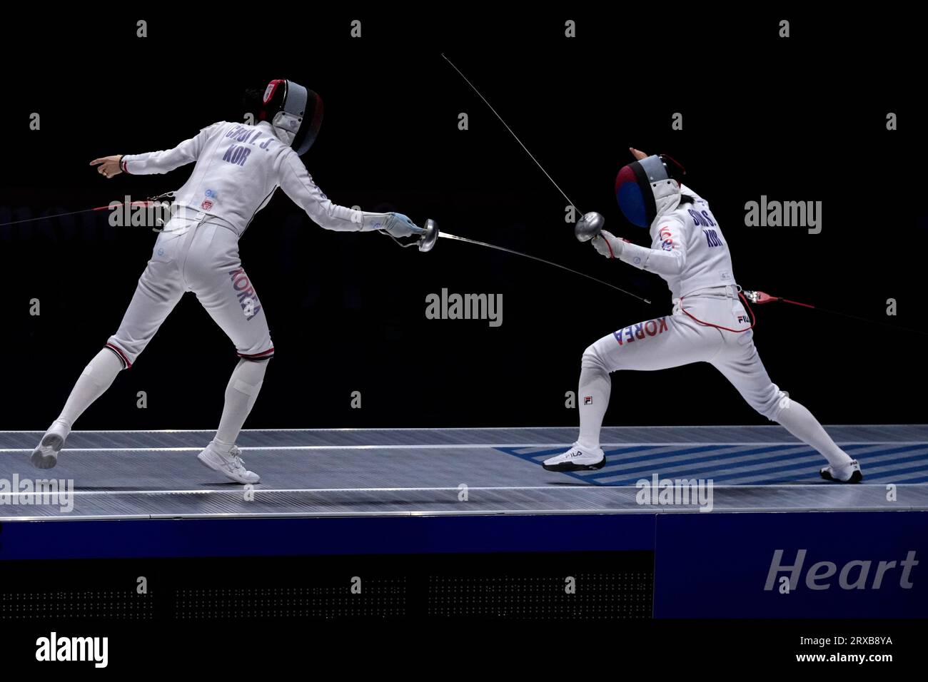 Injeong Choi of South Korea, left, competes with Sera Song of South ...