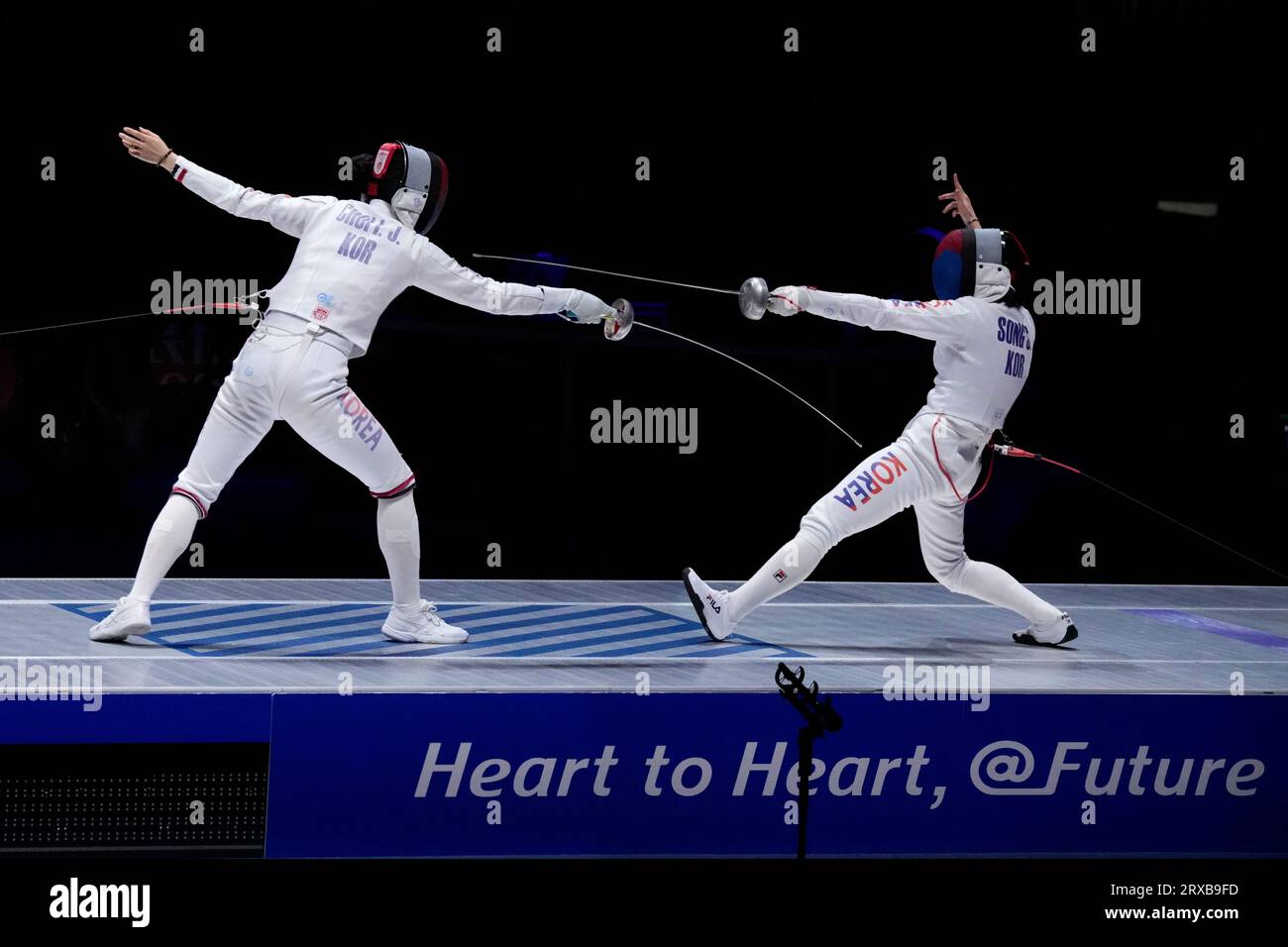 Injeong Choi of South Korea, left, competes with Sera Song of South ...