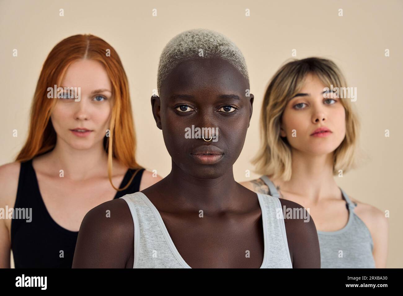 Cool gen z Black blonde girl with diverse models on background, beauty ...