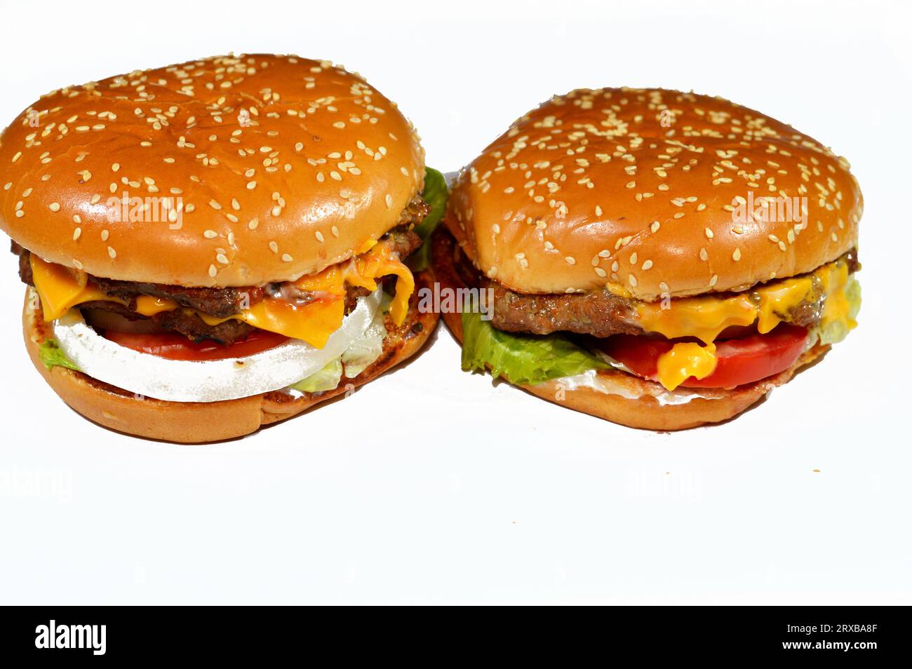 A juicy thick double beef patty with cheese covered with sauce, crispy ...