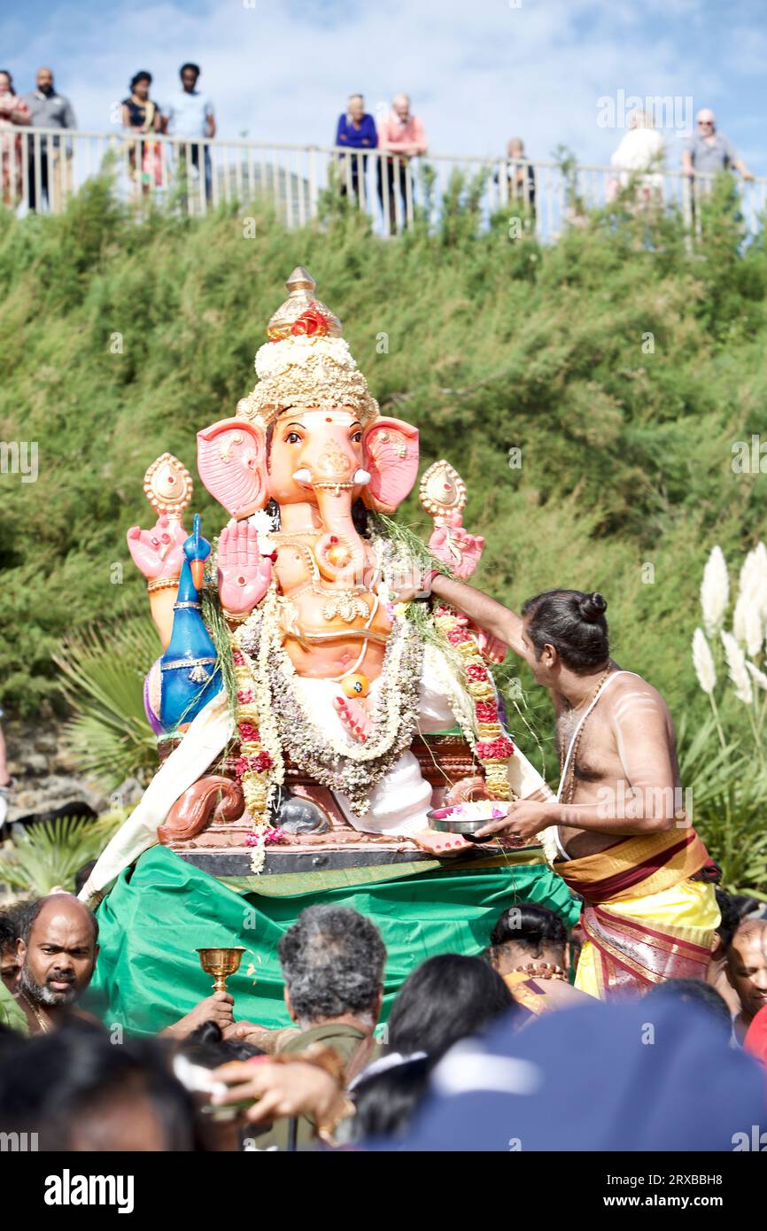 Holy man blessing food on this the last day of Chathurthi festival ...