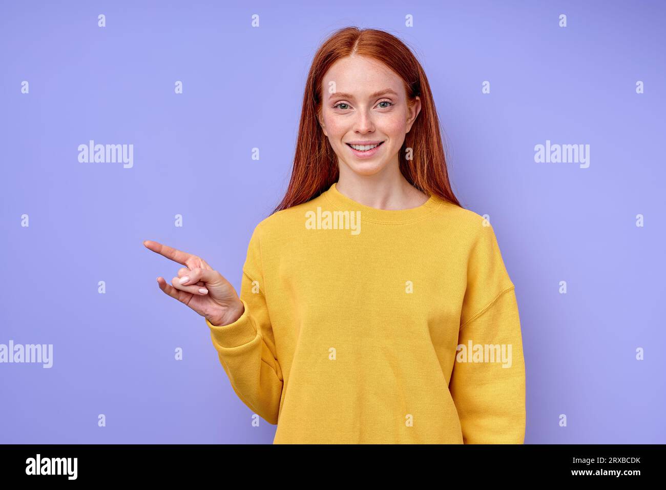 beautiful happy confident redhead woman in yellow stylish sweater ...