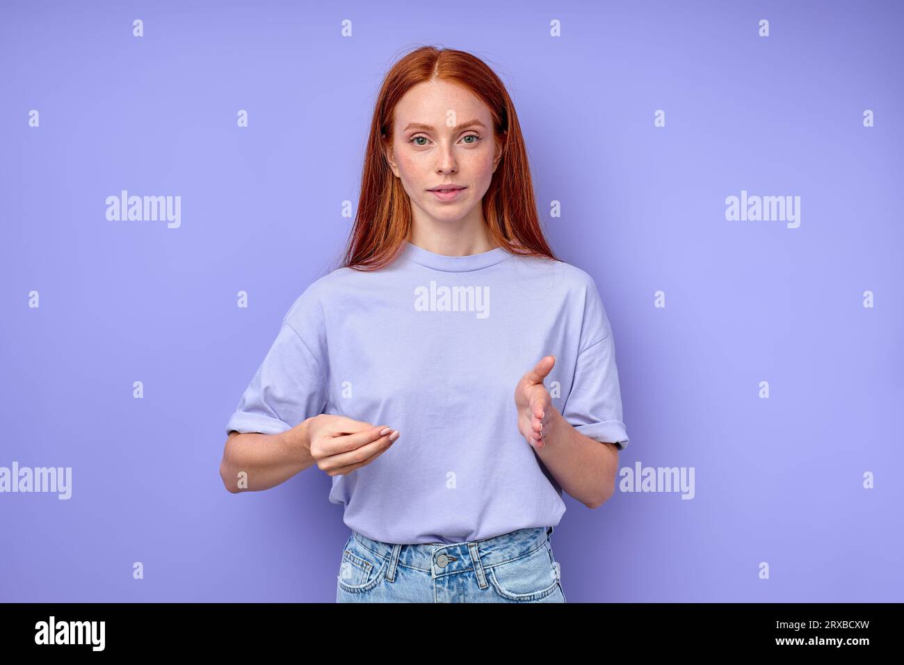 active beautiful ginger deaf woman learning sign language, close up ...