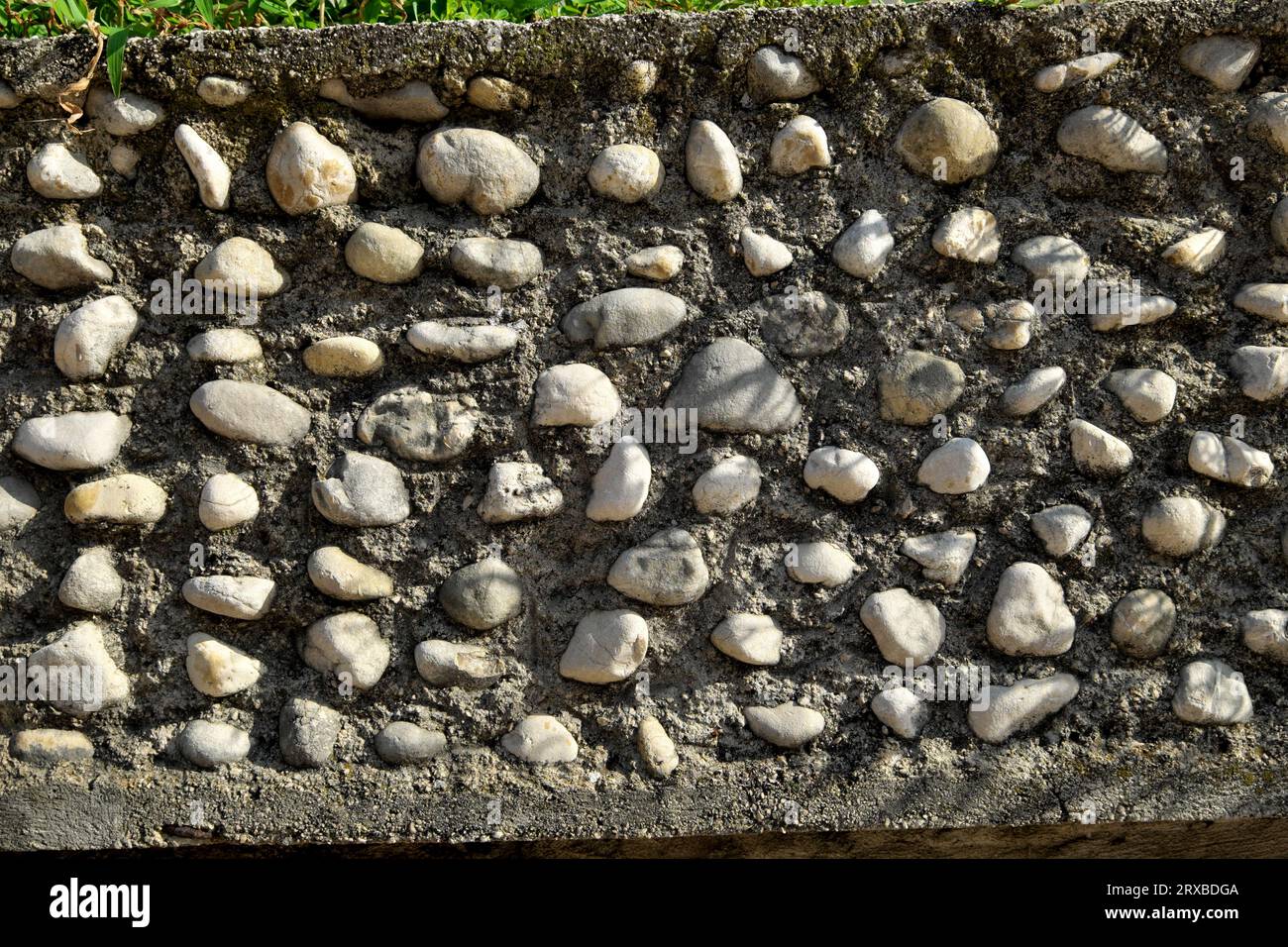 Pebbles concrete stone background hi-res stock photography and images ...