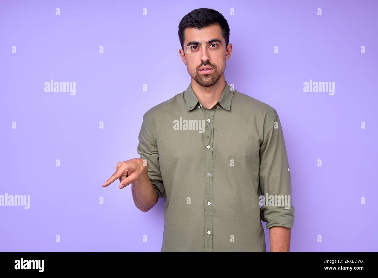 serious handsome man showing letter Q q with fingers .the Alphabet in ...