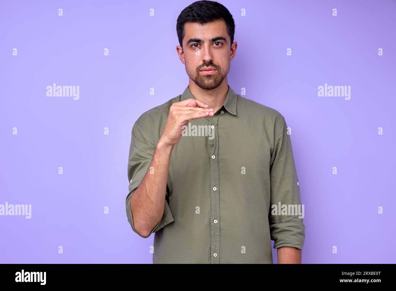 serious handsome man showing letter M m with fingers .the Alphabet in ...