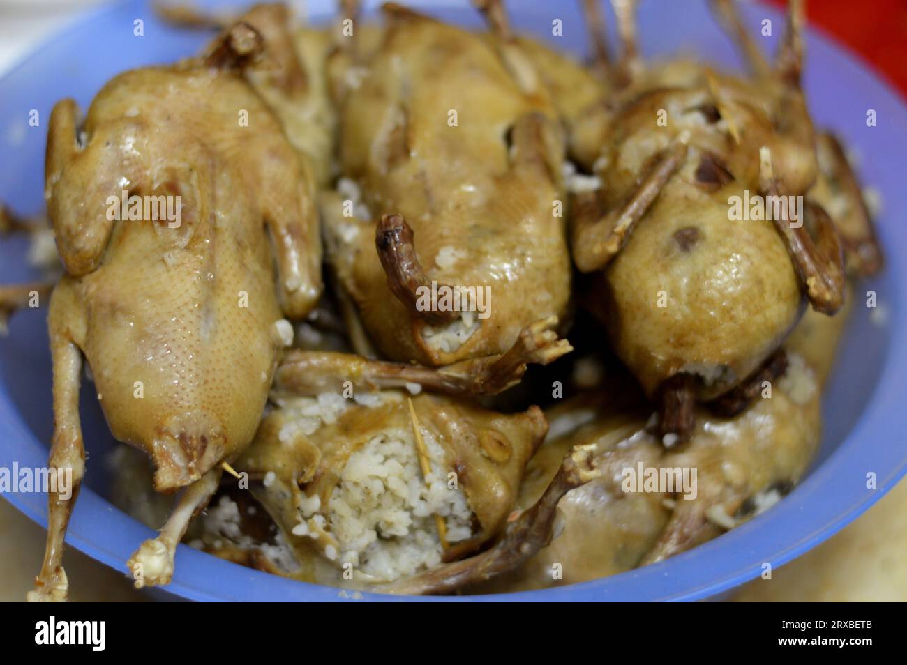 Boiled white rice stuffed pigeons or Hamam mahshi, boiled until cooked ...