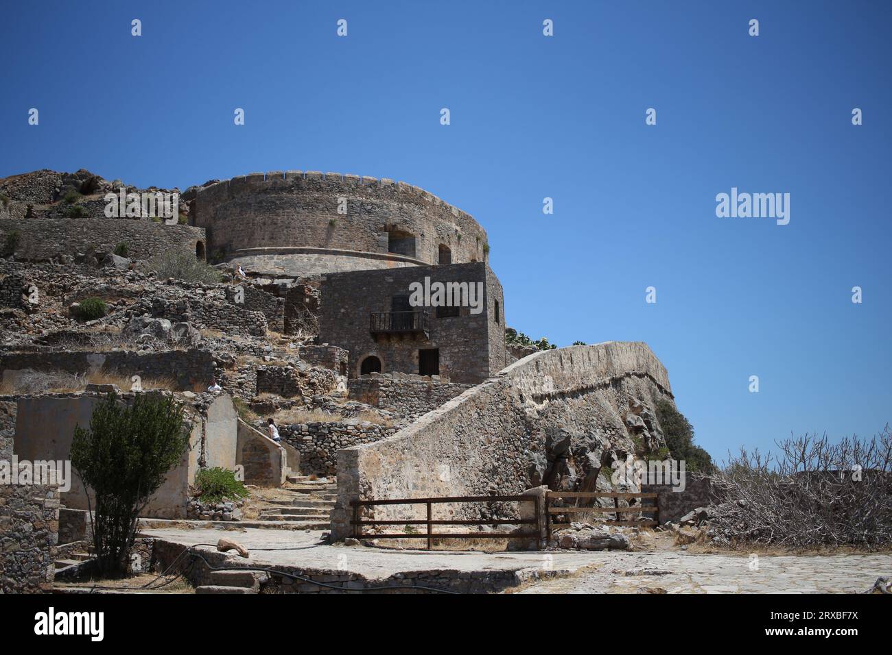 Dilapidated houses on a Greek island Spinalonga, a former Venetian ...