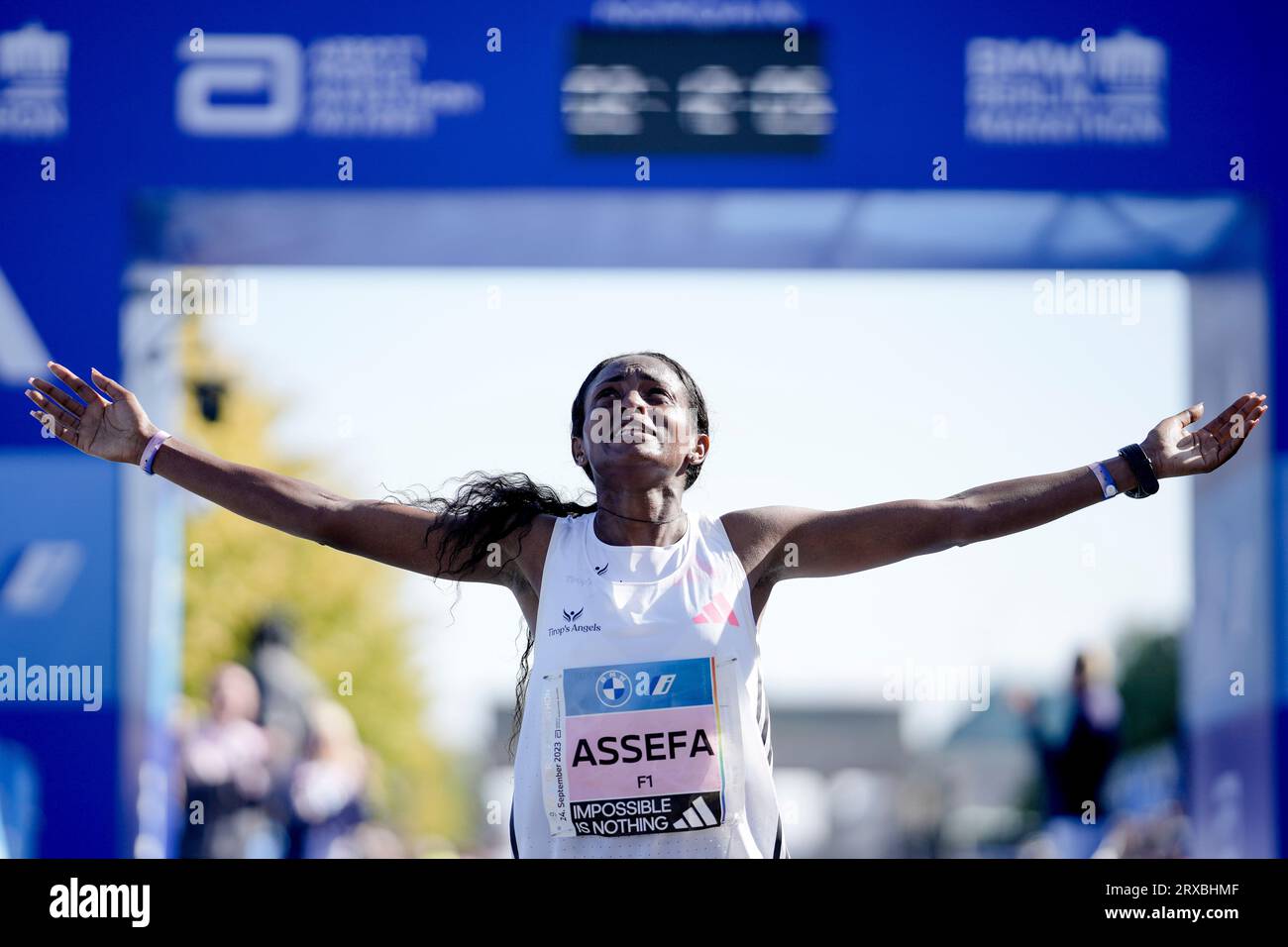 Ethiopia's Tigist Assefa celebrates as she crosses the finish line to ...