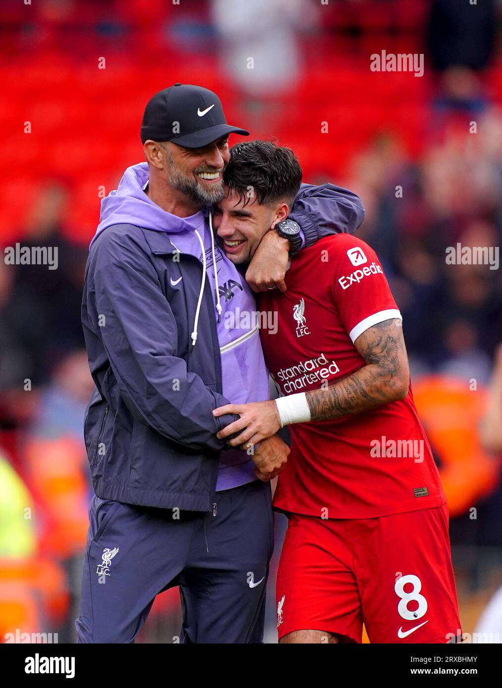 Liverpool manager Jurgen Klopp hugs Dominik Szoboszlai at the end of ...