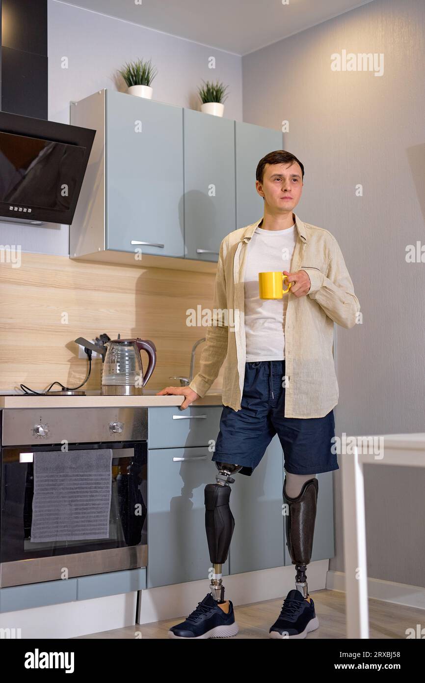 Man with prosthetic legs in care hi-res stock photography and images ...
