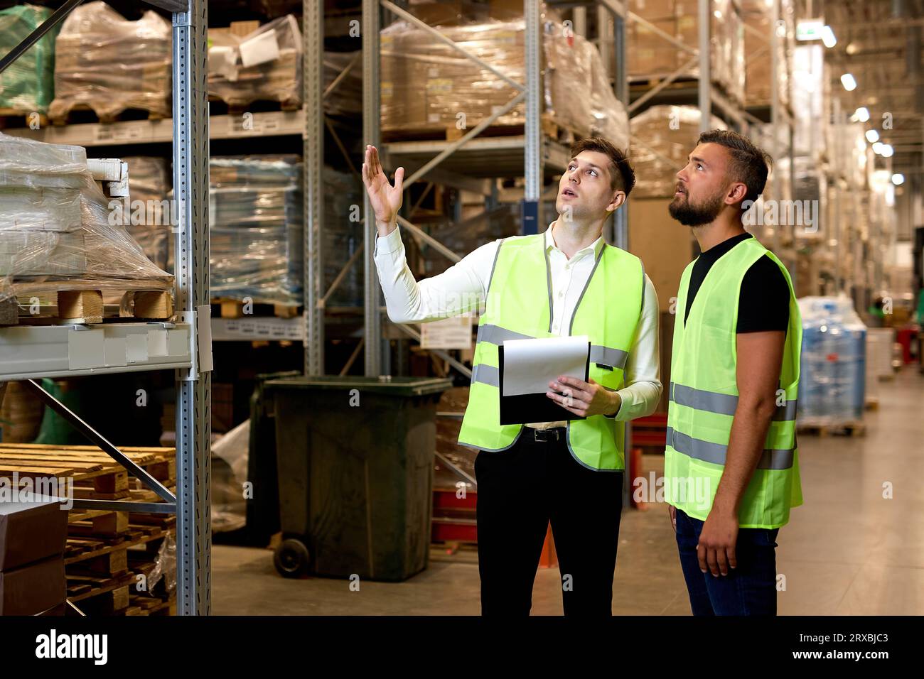 Guys warehouse workers talking,warehouse industry and logistics concept ...