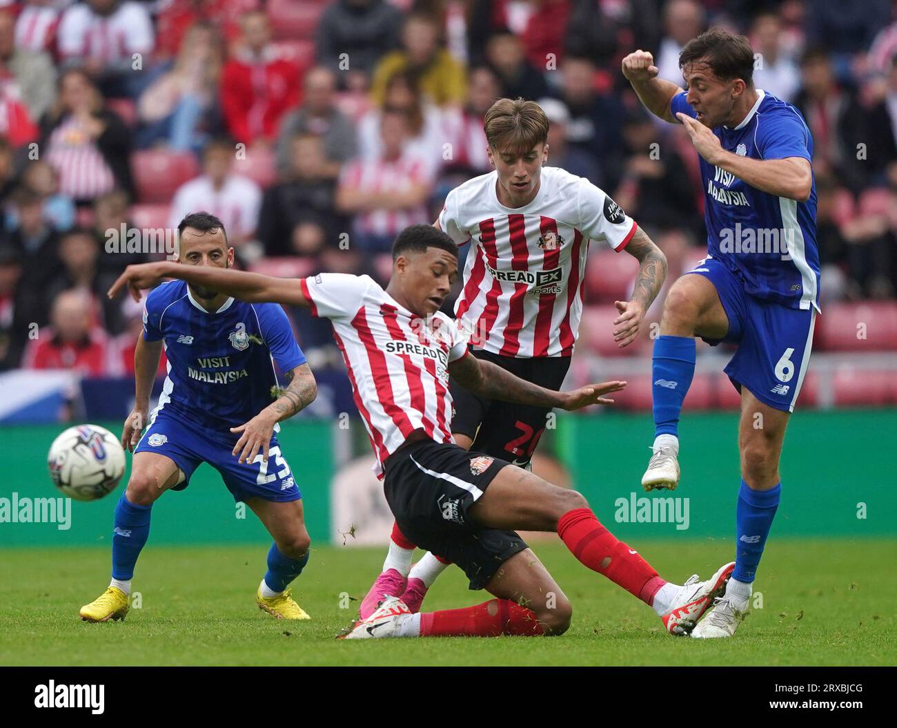 Sunderland's Mason Burstow and Cardiff City's Ryan Wintle battle for ...