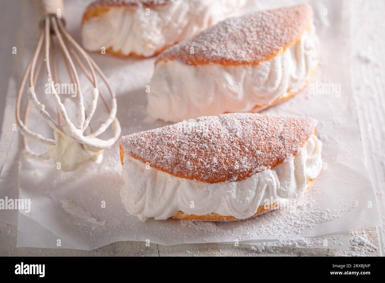 Sweet tacos made from sponge cake and cream. Caster sugar and stuffed ...