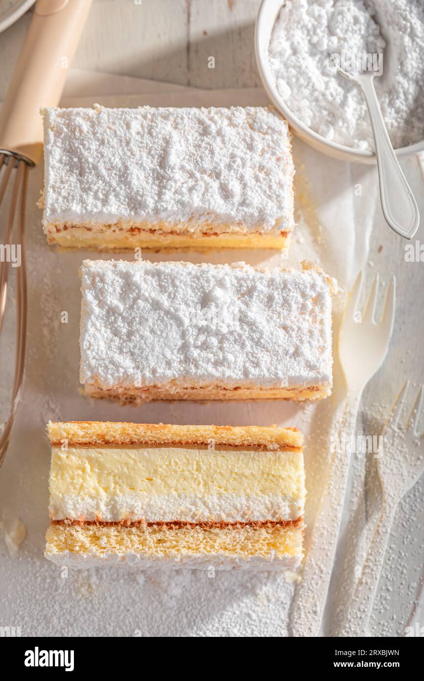 Delicious napoleon cake filling with custard cream. Kremowka cake with ...
