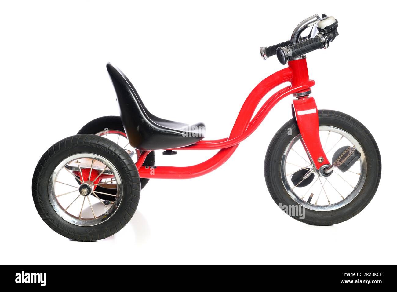 Children's tricycle on a white background Stock Photo - Alamy
