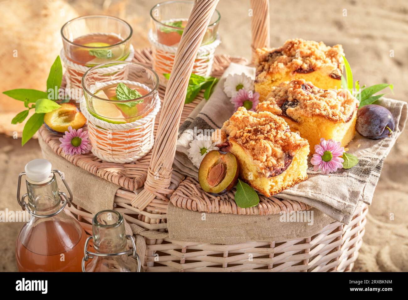 Sweet plum yeast cake on beach with lemonade in summer. Yeast cake ...