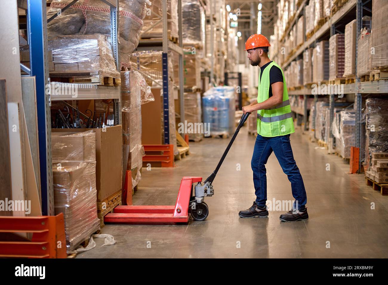Warehouse worker using forklift place hi-res stock photography and ...