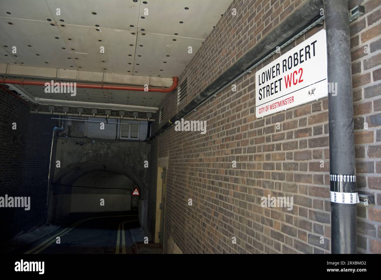 street name sign for lower robert street, london, england, a little ...