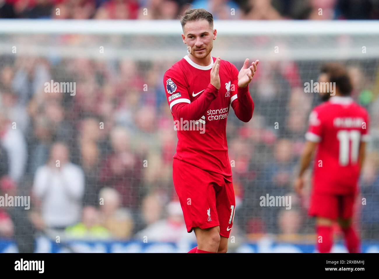 Liverpool's Alexis Mac Allister walks off to be substituted during the ...