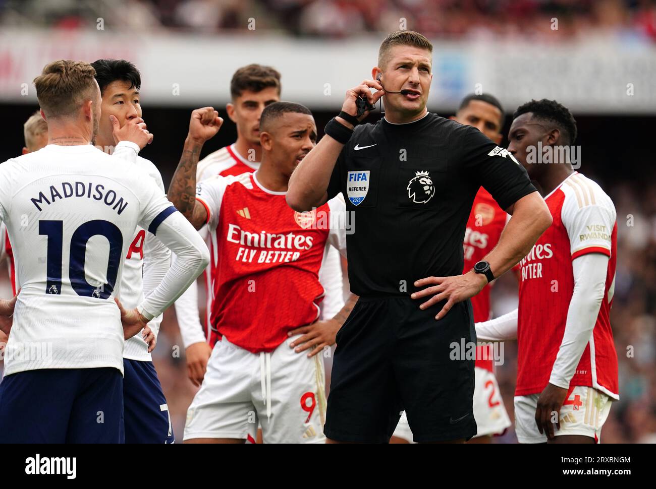 Referee Robert Jones awaits a VAR decision during the Premier League ...