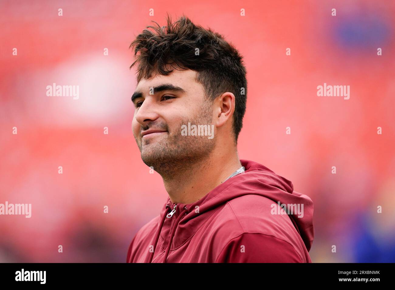 Washington Commanders quarterback Sam Howell walking on the field ...