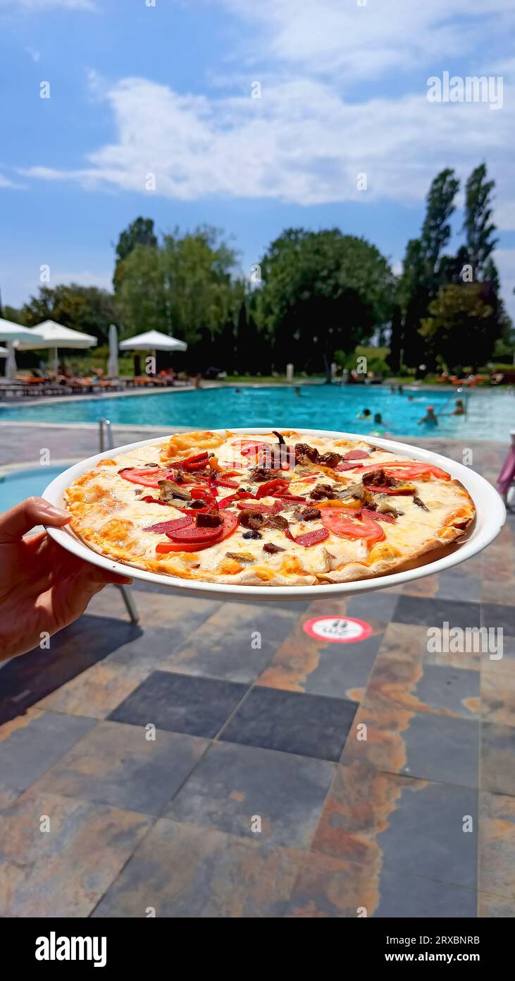 Person holding snack hi-res stock photography and images - Alamy