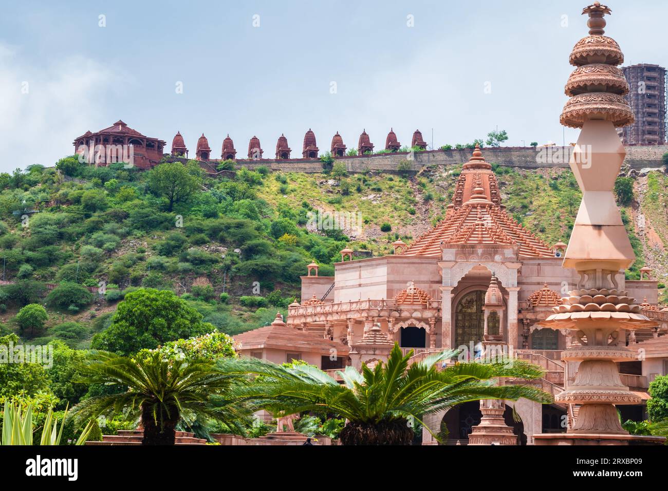 artistic red stone jain temple at morning from unique angle image is ...