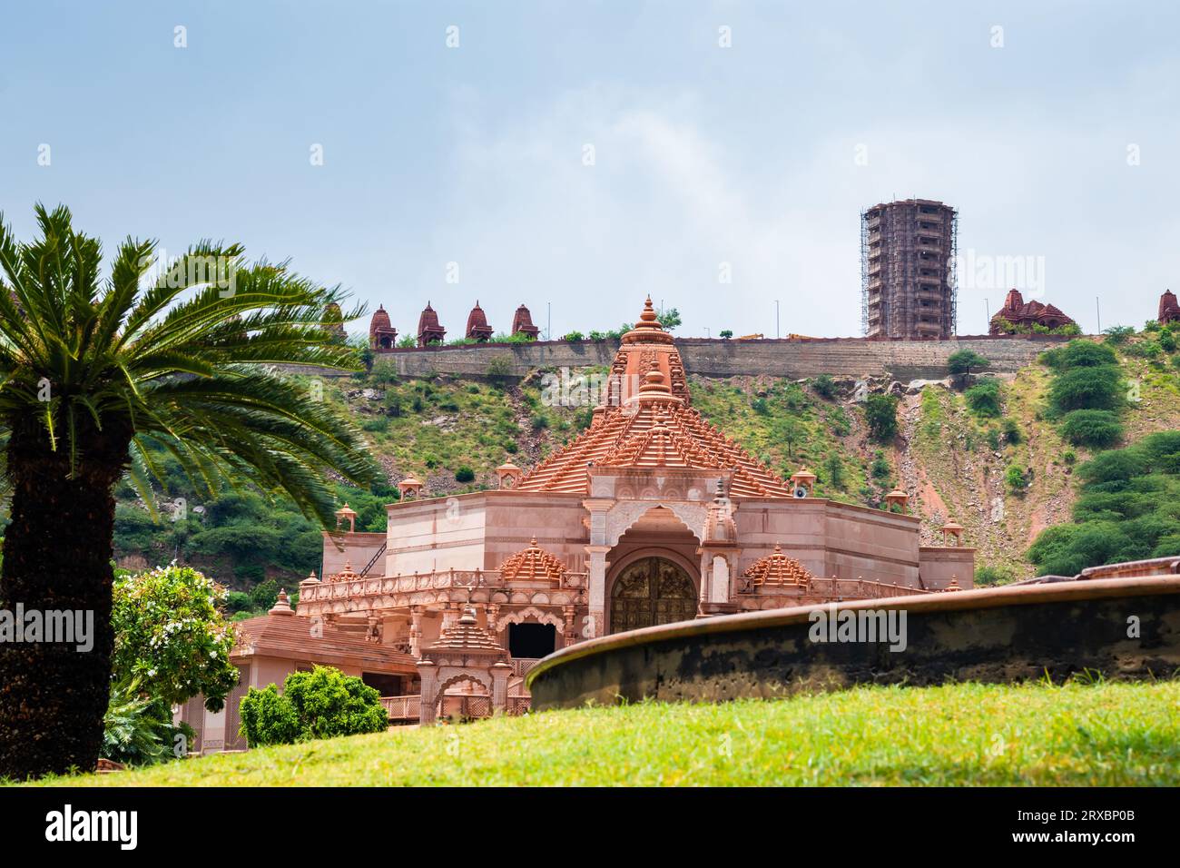 artistic red stone jain temple at morning from unique angle image is ...