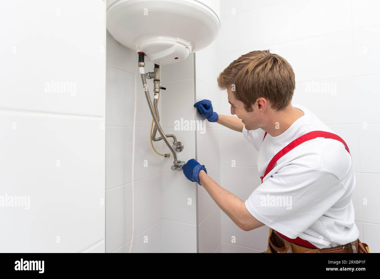 Professional engineer doing a boiler inspection at home Stock Photo - Alamy