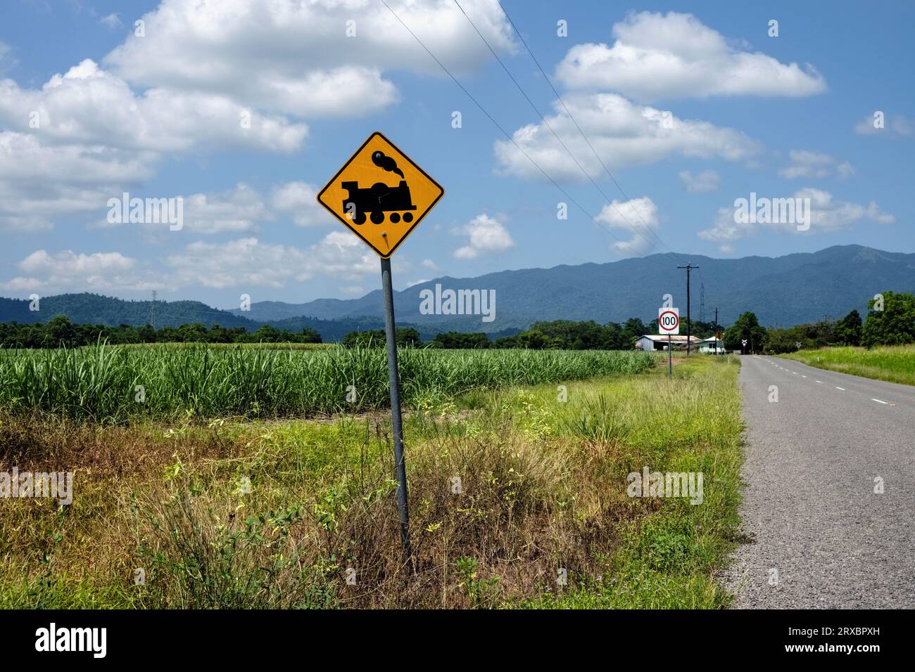 Sign warning of sugar cane trains on the 'Cane Cutters Trail', near ...