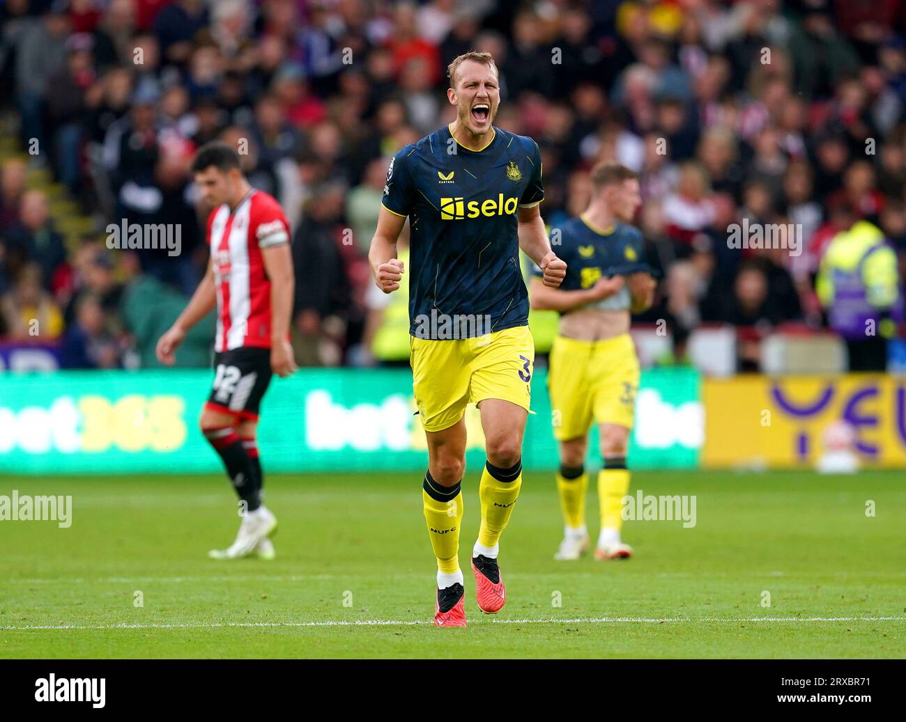 Newcastle United's Dan Burn celebrates scoring their side's second goal ...