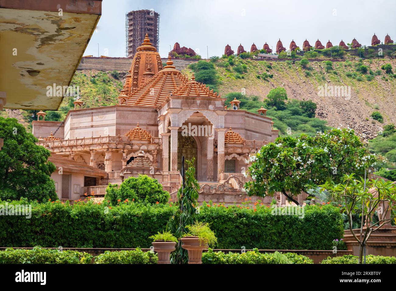 artistic red stone jain temple at morning from unique angle image is ...
