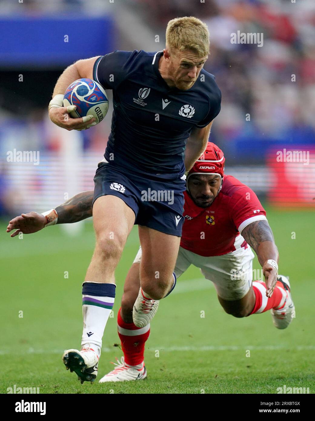 Scotland's Kyle Steyn breaks through to score a try during the Rugby ...