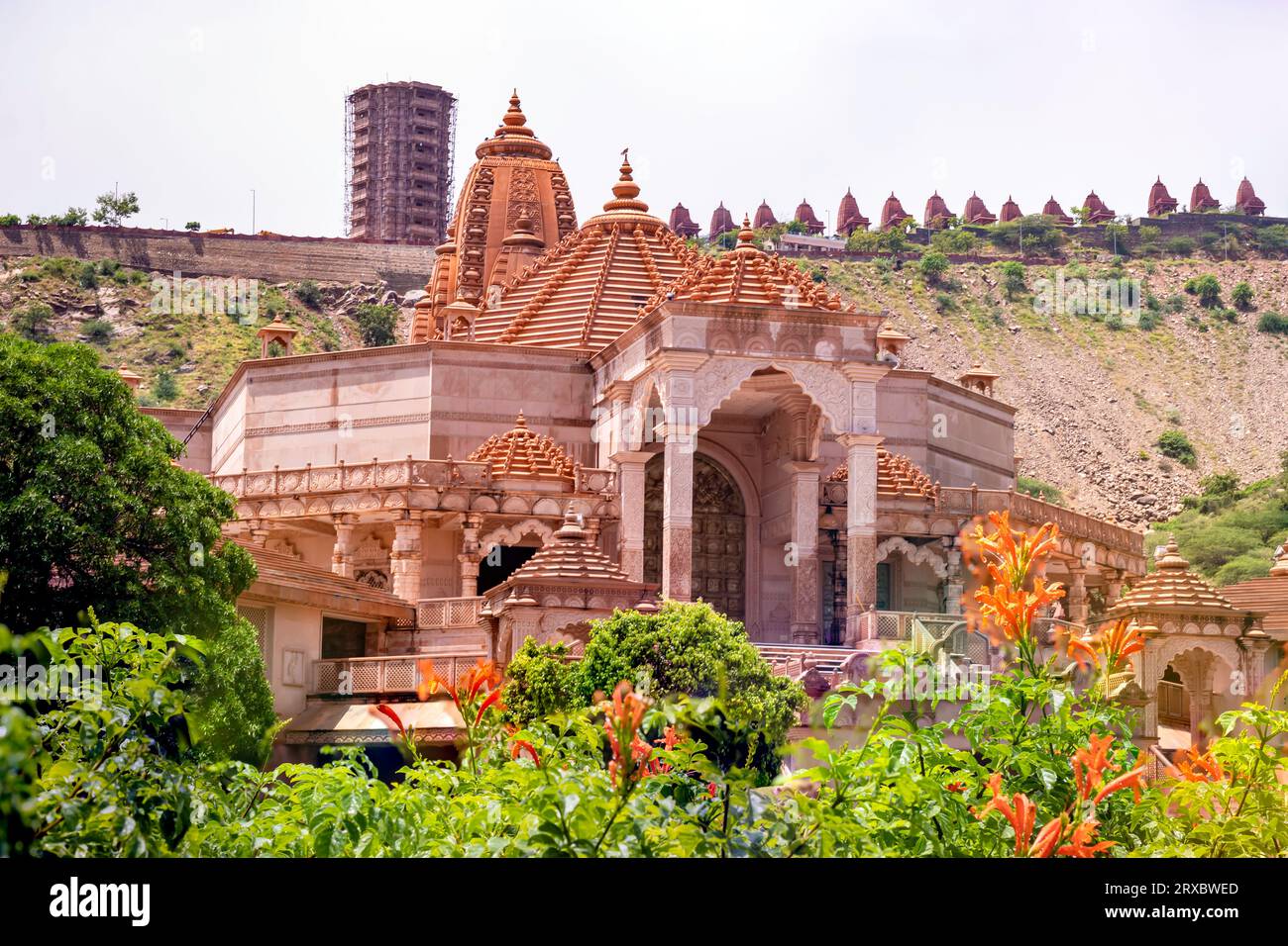 artistic red stone jain temple at morning from unique angle image is ...