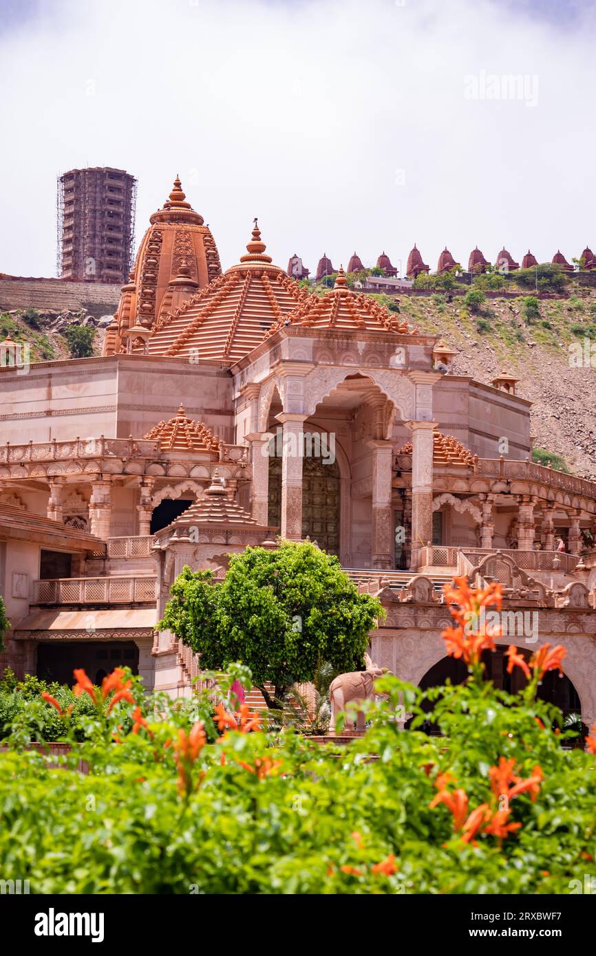 artistic red stone jain temple at morning from unique angle image is ...