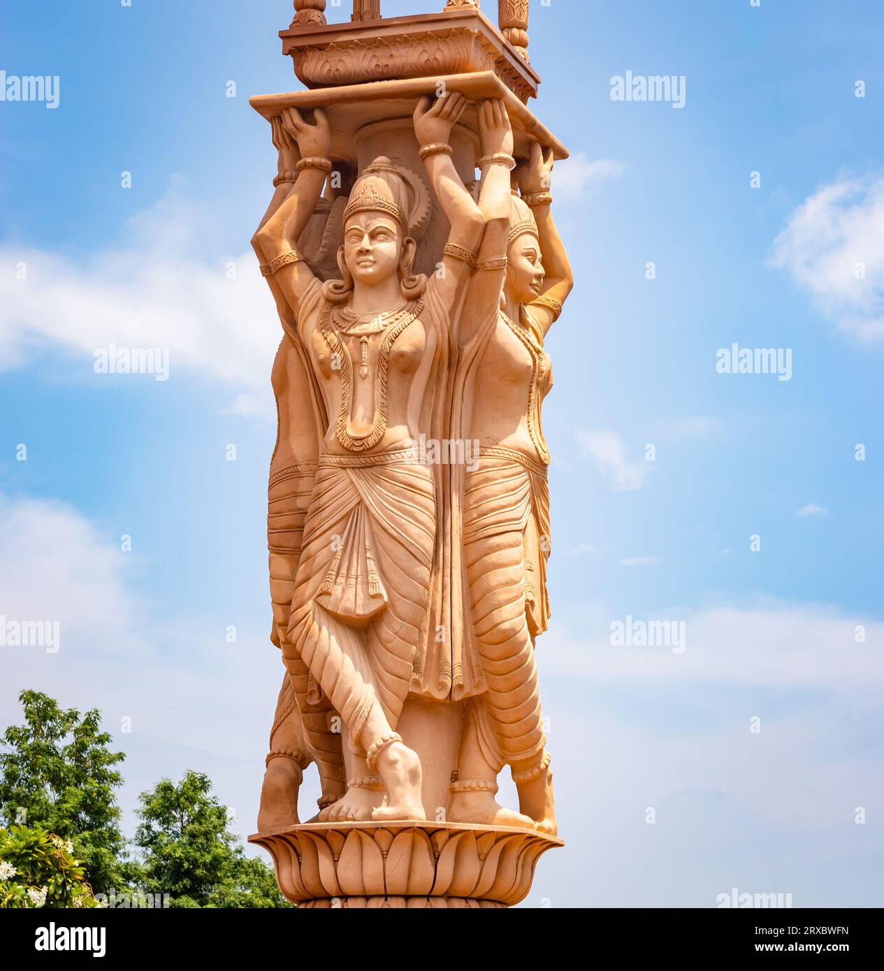 artistic red stone jain god holy pillar at morning from unique angle ...