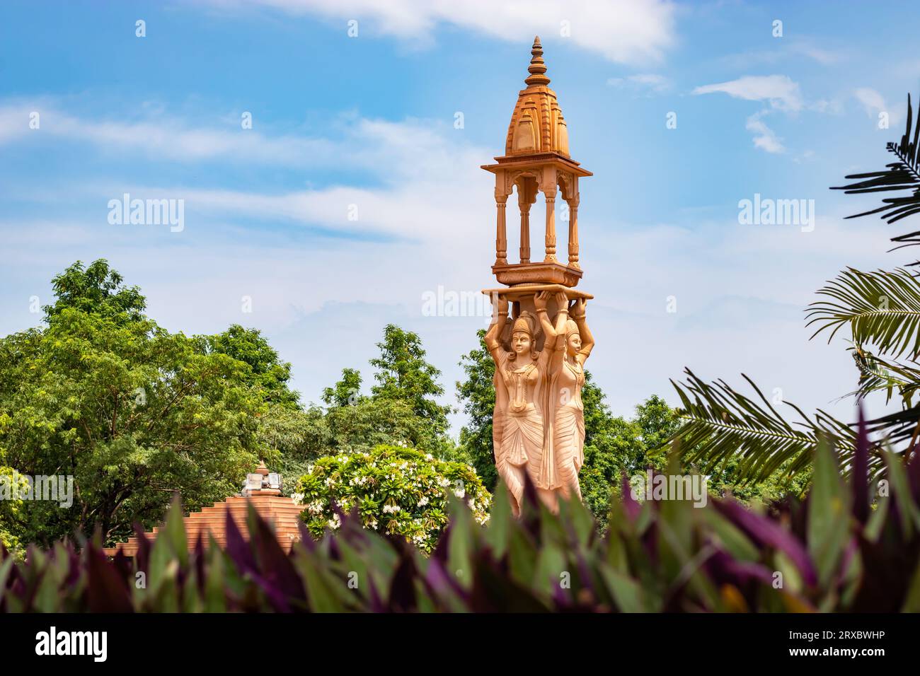 artistic red stone jain god holy pillar at morning from unique angle ...