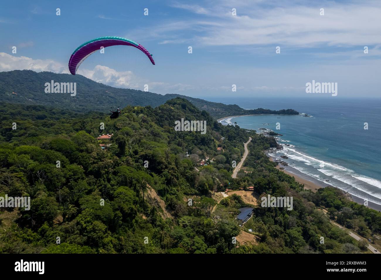 Aerial View of extreme paragliding sport in the Beautiful beach in ...
