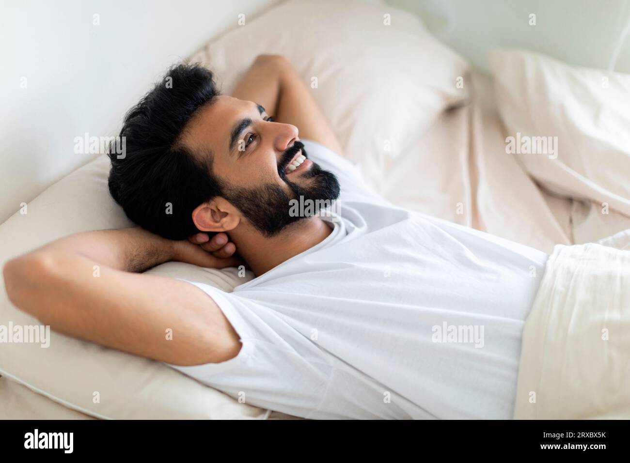 Good Morning. Portrait Of Happy Indian Man Waking Up In Comfortable Bed ...