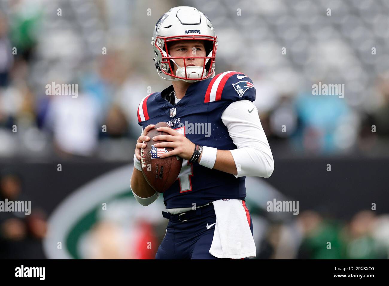 New England Patriots quarterback Bailey Zappe (4) warms up before ...