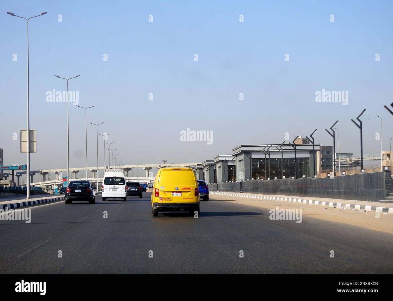 Cairo, Egypt, August 31 2023: DHL truck on its way delivering a package ...