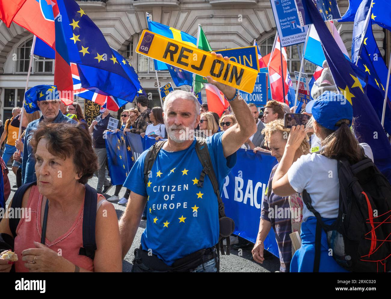 London, UK. 23 Sep 2023: An anti-Brexit protester holds a "Rejoin" sign ...