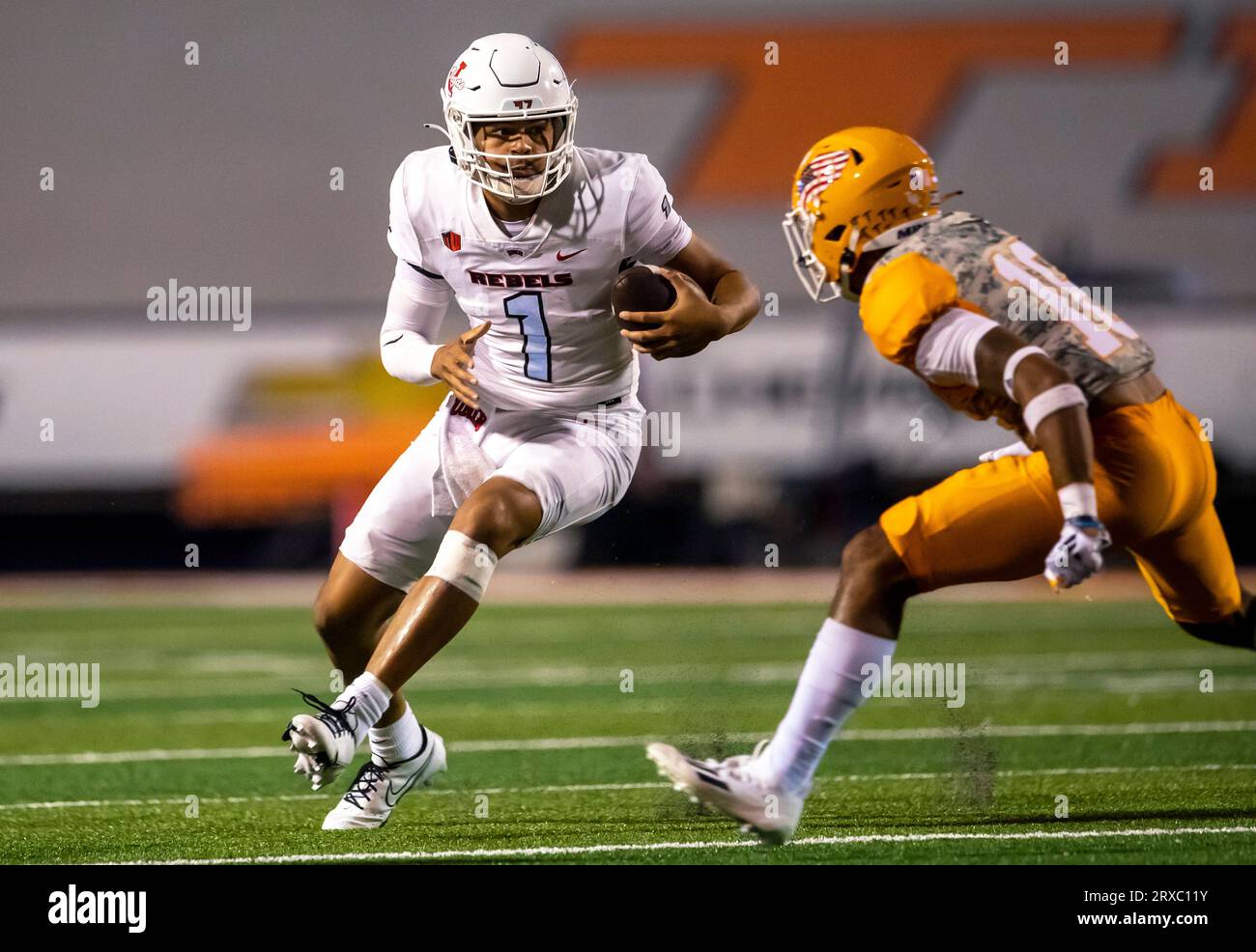 UNLV quarterback Jayden Maiava (1) tries to elude UTEP safety Tyler ...