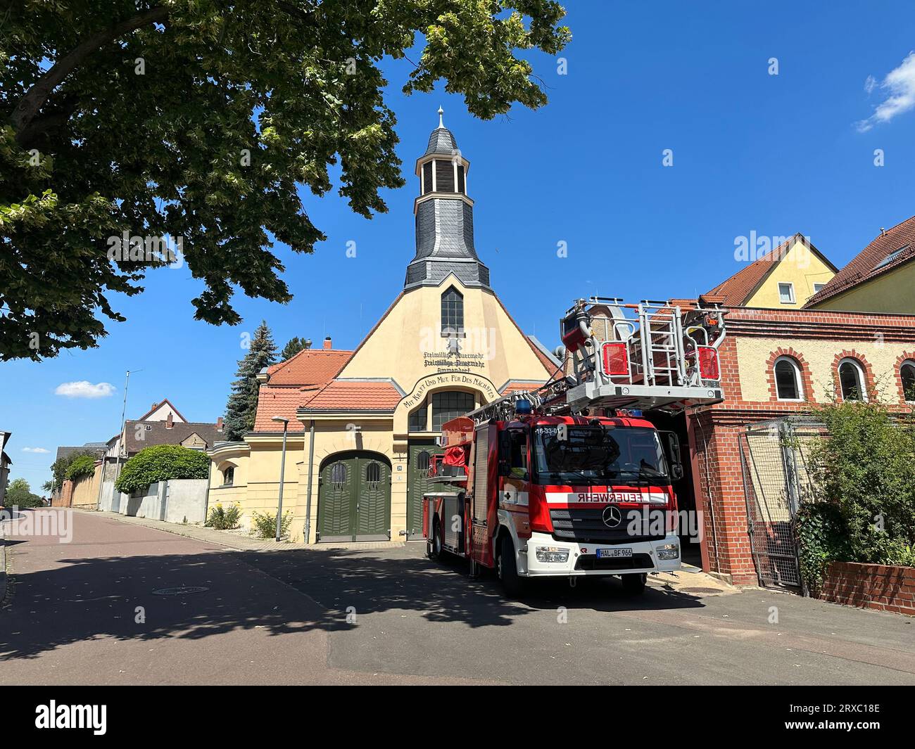 Historic fire station with modern fire truck in Germany Stock Photo - Alamy